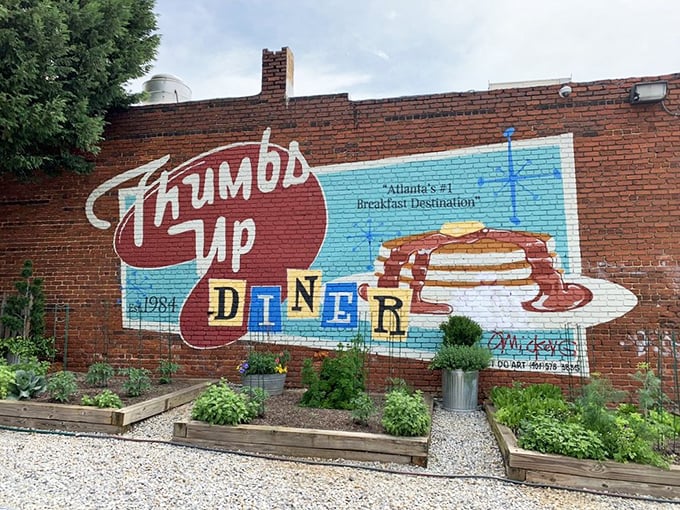A mural that says it all: Thumbs Up isn't just a diner; it's Atlanta's breakfast destiny, served with a side of local pride.