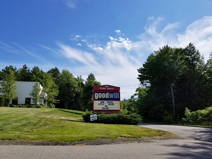Goodwill: Where shopping meets nature. This picturesque sign invites you to embark on a thrifting adventure in the heart of Maine's beauty.