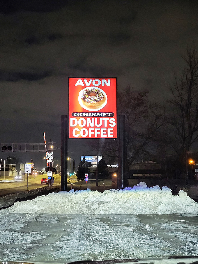 A beacon of hope in a world of darkness (and diet plans)! Avon's sign shines like a North Star for donut pilgrims everywhere.