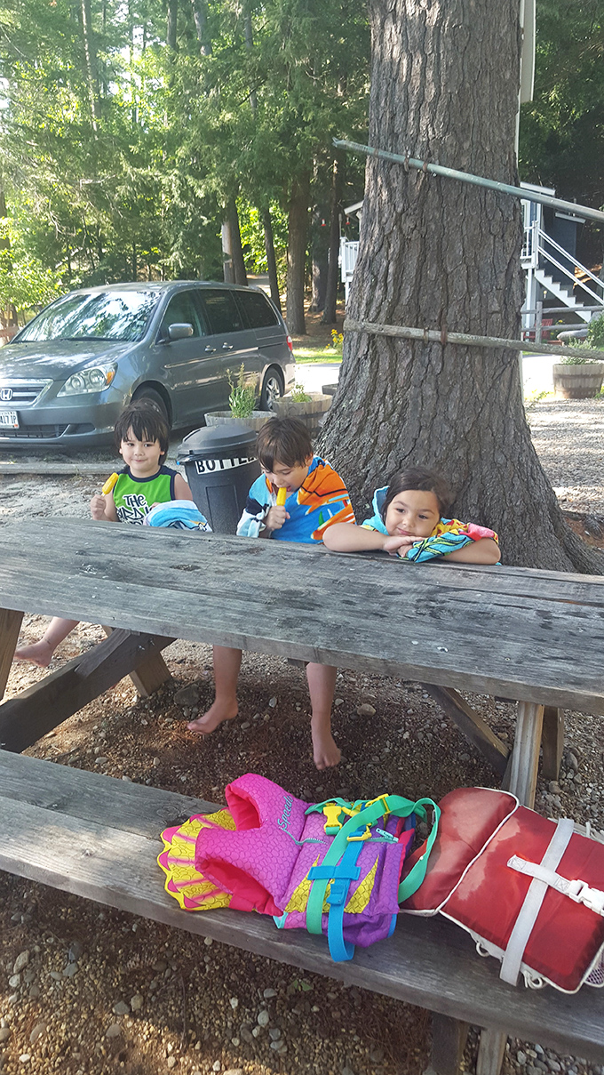 Squad goals, lakeside edition! These kiddos are living proof that the best summer memories are made with sandy toes and sticky popsicle fingers.