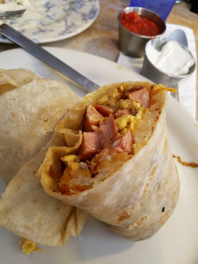 Burrito or edible work of art? This handheld masterpiece proves that sometimes, the best things in life come wrapped in a tortilla.