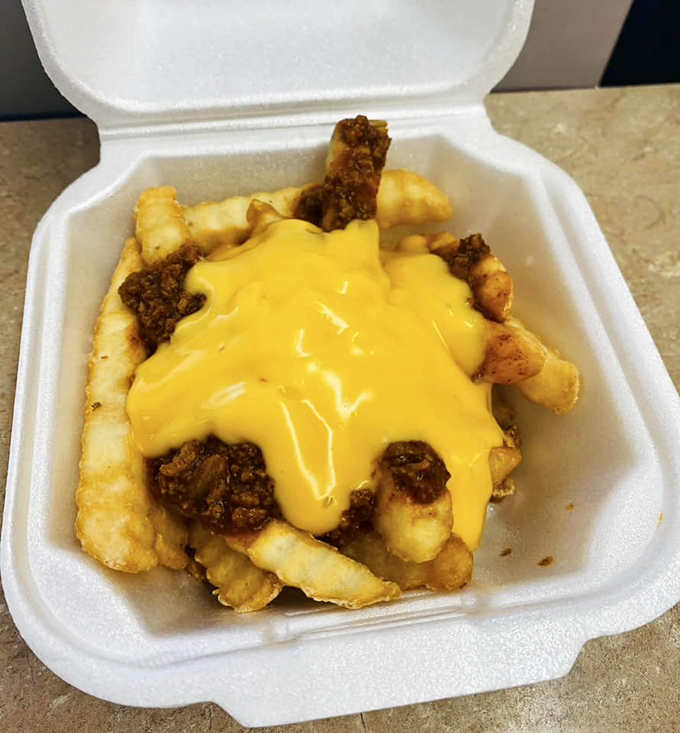 Chili cheese fries: A glorious mess of flavor that laughs in the face of utensils. Fork? Where we're going, we don't need forks!