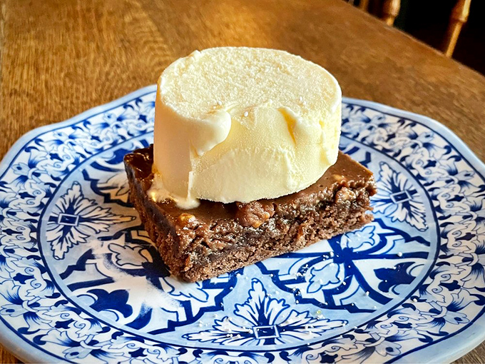 Chocolate sheet cake that's moister than a monsoon and richer than an oil tycoon. With a scoop of ice cream, it's pure Texan gold.