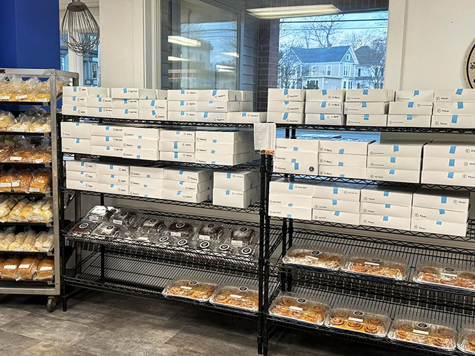 Boxes upon boxes of baked goodness, waiting to be taken home. It's like a library, but instead of books, it's filled with edible joy.