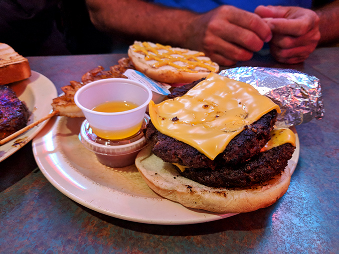 Cheesy does it! This burger is living its best life, and it wants you to join the party.