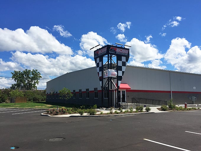 The house that speed built. This exterior promises a world of high-octane thrills waiting just beyond those doors.