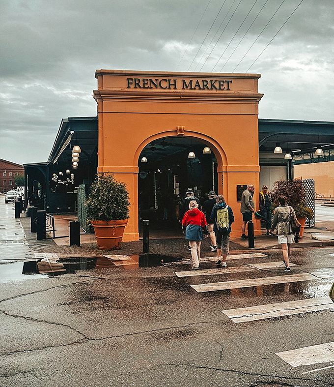 Rain or shine, the French Market beckons! Even on a gloomy day, this entrance promises a colorful adventure inside. Time to make a splash!