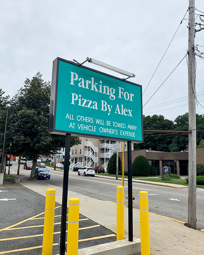 VIP parking for pizza lovers! This sign is basically saying, "If you're not here for the 'za, keep on driving, pal!"