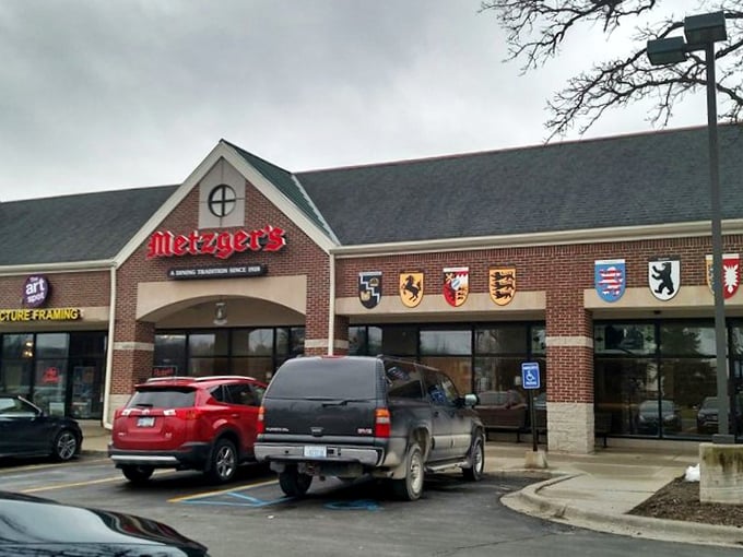 Even the parking lot screams "Gem&uuml;tlichkeit!" Those shields aren't just for show &ndash; they're guarding a treasure trove of culinary delights inside.