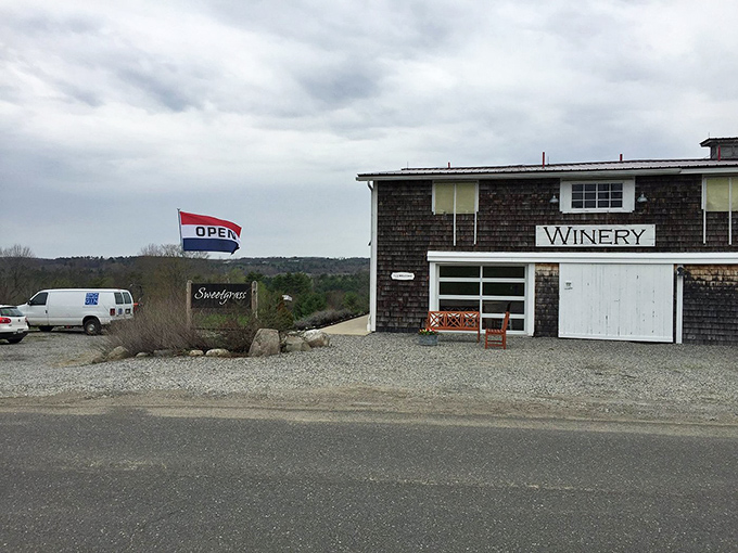 The "Open" flag waves like a checkered flag at the Indy 500, signaling the start of your wine-tasting adventure. Ready, set, sip!