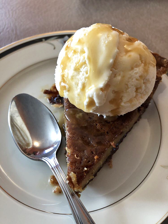 The grand finale: a slice of heaven. Paired with ice cream, it's the perfect sweet ending to a savory adventure.