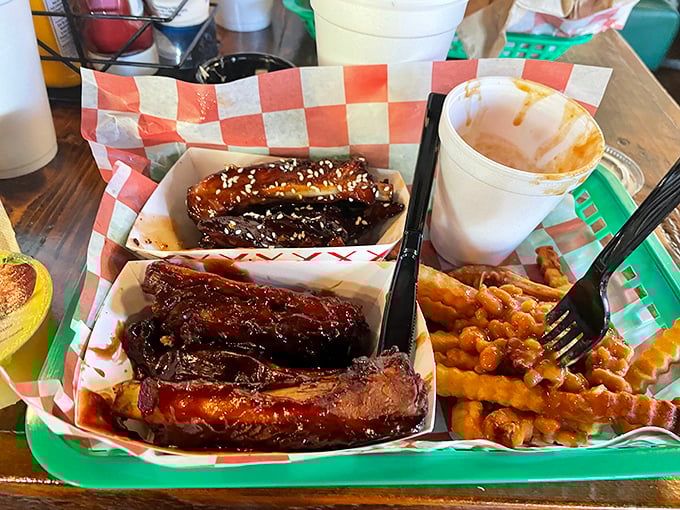 These ribs are so tender, they practically fall off the bone with a gentle breeze. Napkins required, but dignity optional!