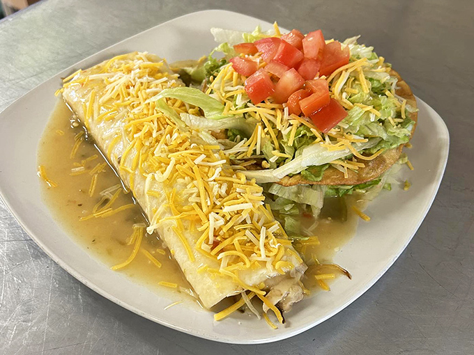 Wrap your taste buds around this! This cheese-covered beauty is like a warm, comforting hug in enchilada form.