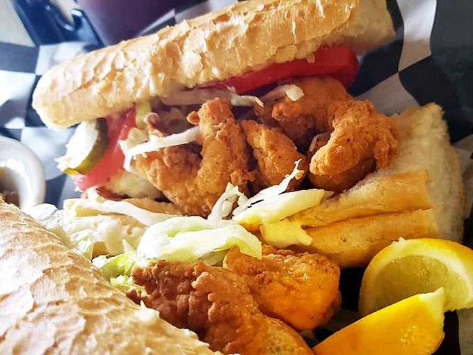 The po-boy that's rich in flavor! Crispy shrimp nestled in crusty bread - it's a New Orleans tradition that's anything but poor.