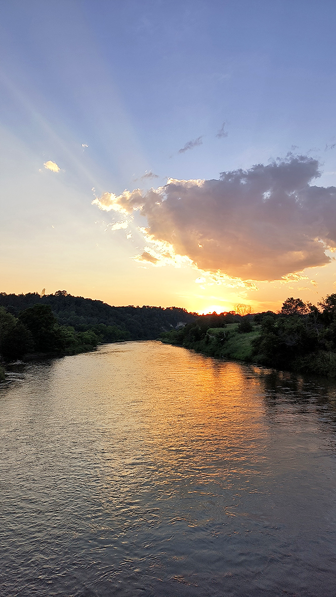 "Nature's own light show!" As the sun sets over the Niobrara, the river transforms into a golden highway to adventure.