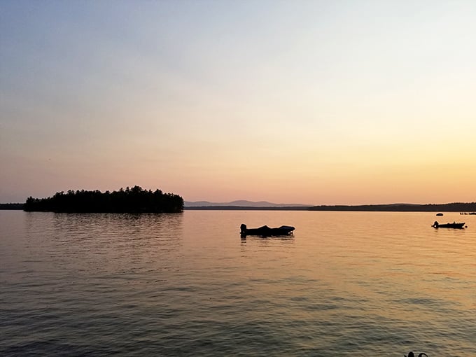 "Twilight magic: when the lake becomes liquid gold." As day fades to night, the water transforms into a mirror of amber light, perfect for quiet contemplation.