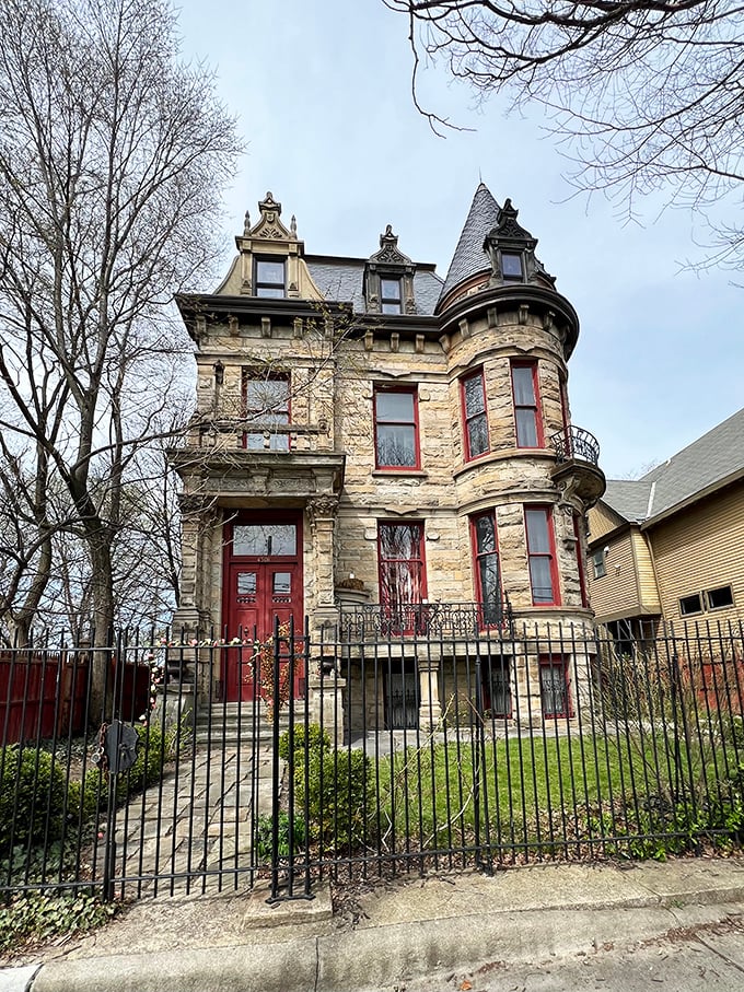 Daytime reveals the castle's true character. A stone sentinel in a sea of modernity, Franklin Castle stands proud and slightly peculiar.