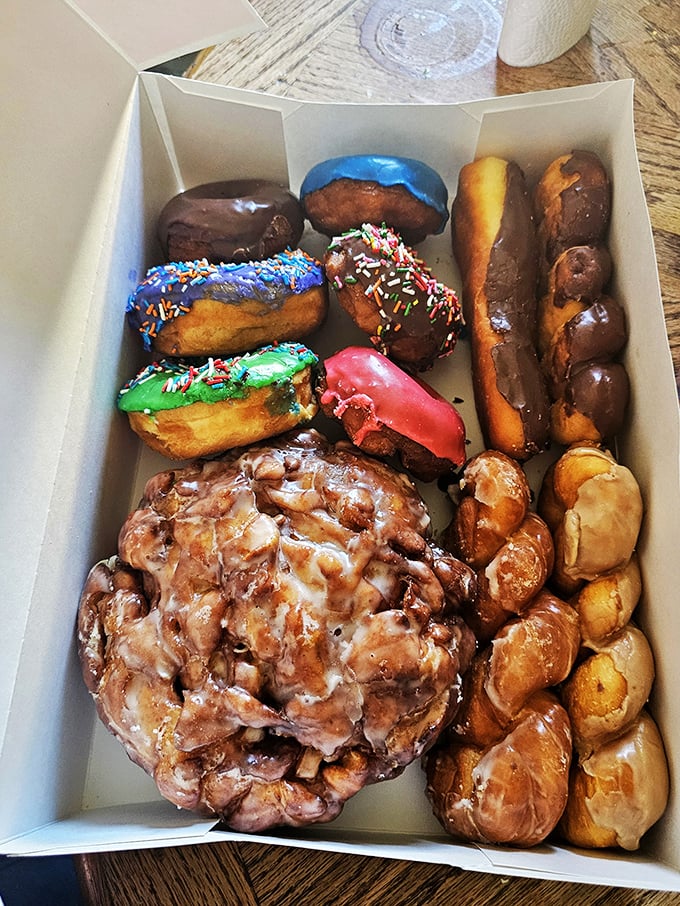 A box of pure joy! This assortment is like a party in pastry form, each donut a different dance of flavor on your tongue.