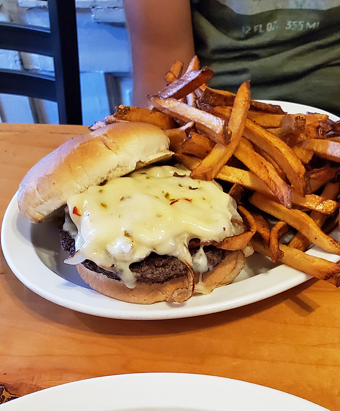 A burger so good, it could unite politicians. Melty cheese, golden fries - it's the American dream on a plate.