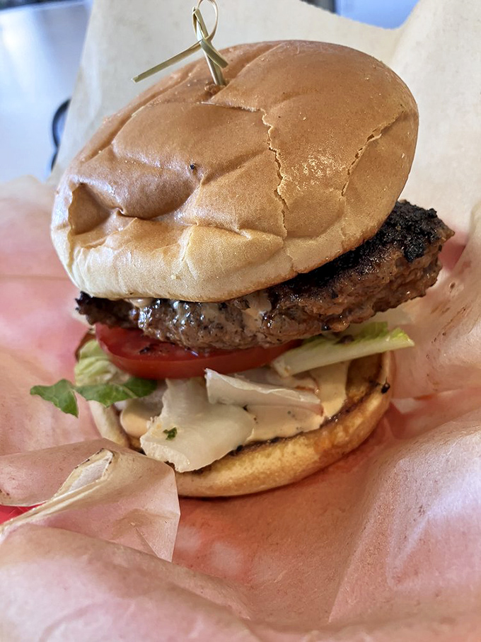 Burger alert! This isn't your average patty. It's like if a classic American burger went on a Cuban vacation and came back transformed.