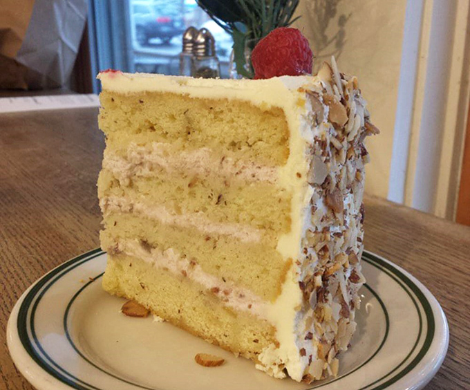 Layer upon layer of cake perfection! This slice is so pretty, it belongs in a bakery version of the Louvre. But unlike art, you get to eat this masterpiece.