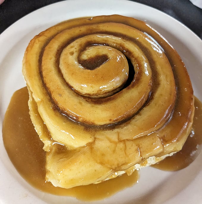 This cinnamon roll is so gooey, it could probably qualify as a new state of matter. Scientists, take note – deliciousness has a new form!