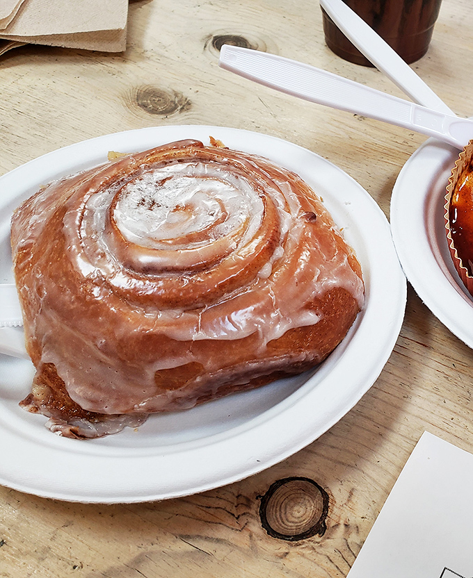 Cinnamon roll the size of your head? Yes, please! It's not gluttony if it's this gloriously gooey.