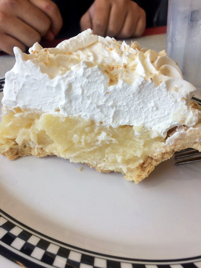 A slice of heaven? No, just Courtesy Diner's coconut cream pie. But honestly, what's the difference? Creamy, dreamy, and utterly divine.