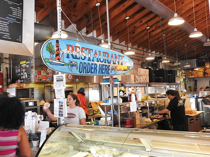 Where the magic happens! Watch the culinary crew work their seafood sorcery behind the counter.