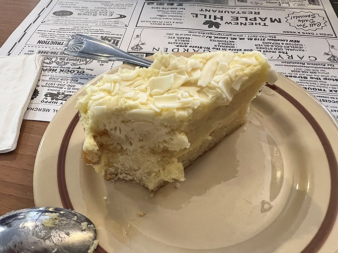 A slice of heaven on a plate. This creamy dessert is proof that sometimes the best way to end a meal is to start planning your next one.