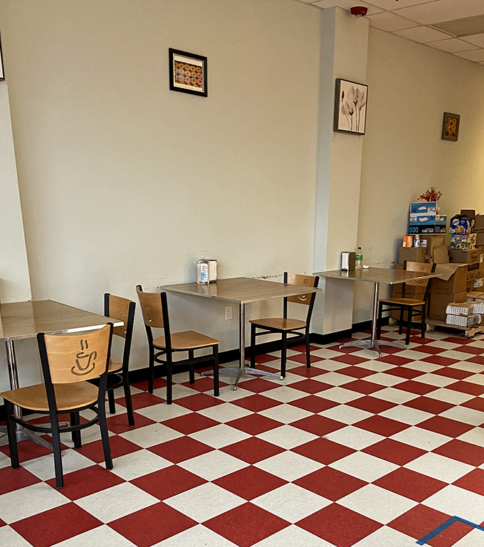 Retro vibes and sugar highs! The cozy dining area invites you to sit, savor, and contemplate the meaning of life (it's donuts).
