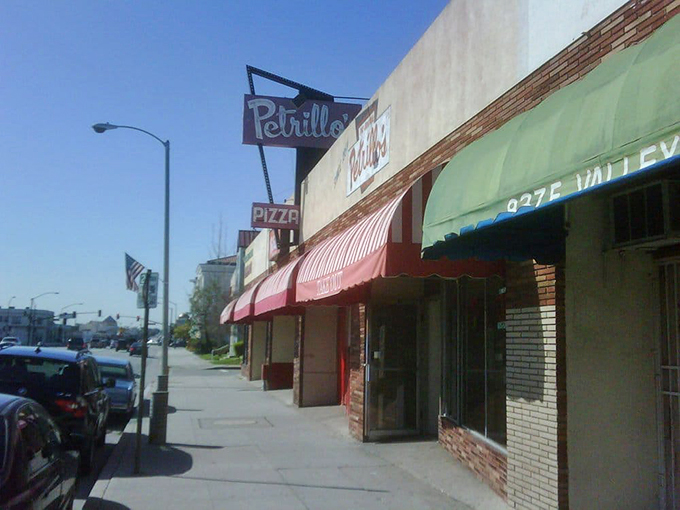 The entrance to flavor town, where every visit feels like coming home. Just follow the aroma of bubbling cheese and happiness!