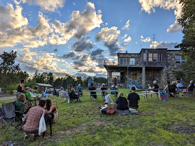 Twilight gathering at the house of Reich. Is it a science seminar or a s&eacute;ance? With this crowd, it could easily be both!
