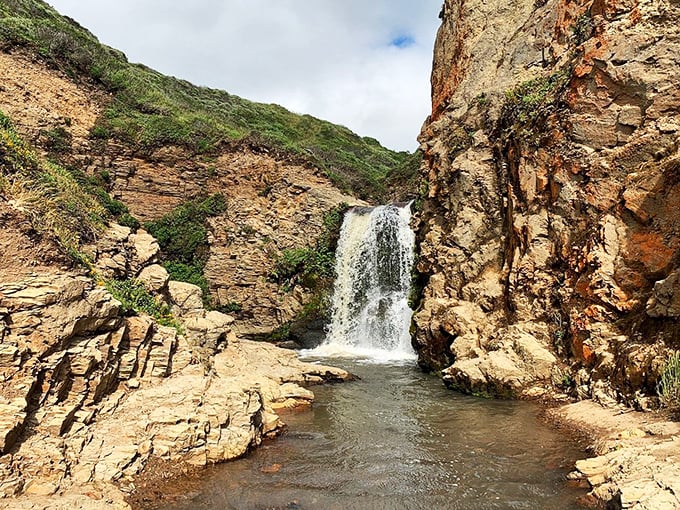 Nature's own spa day! This hidden waterfall oasis looks like the perfect spot to wash away your worries (and maybe a little trail dust).