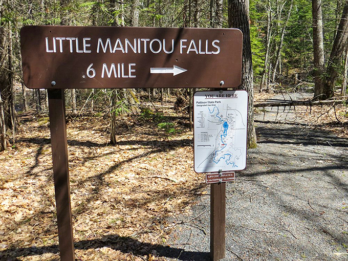 "To Big Manitou Falls and beyond!" This sign points the way to Wisconsin's own version of Niagara.