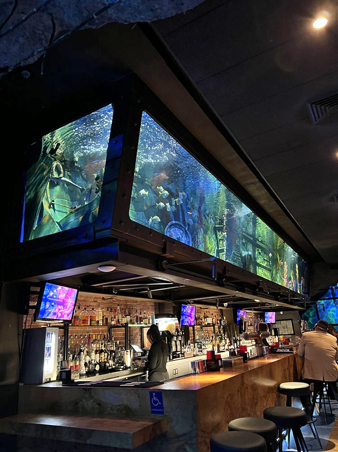 Who needs TV when you've got a mermaid tank? This aquatic show beats anything you'll find on cable, and the drinks are better too!