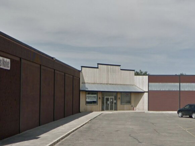 Don't judge a book by its cover... or a flea market by its exterior! This unassuming facade hides a world of wonders waiting to be explored.