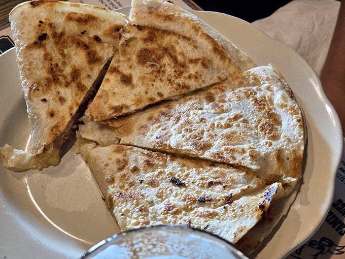 Quesadillas: the perfect food for when you can't decide between a sandwich and a pizza. Crispy, cheesy, and utterly irresistible.
