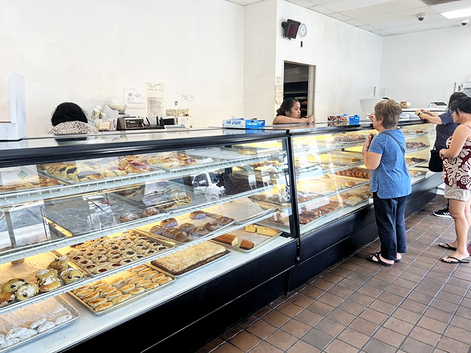 Where the magic happens! These hardworking staff members are the Willy Wonkas of Honolulu, turning simple ingredients into pure imagination.