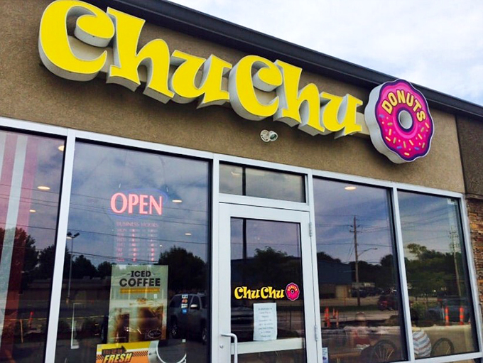 ChuChu Donuts: Where every day is a hole-y day! This storefront is like a portal to a world where calories are just a number and joy is served round.