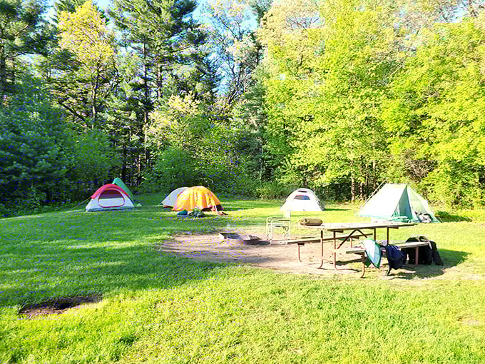 Tent city, population: happy campers. This colorful campground is like a festival of outdoor enthusiasm.