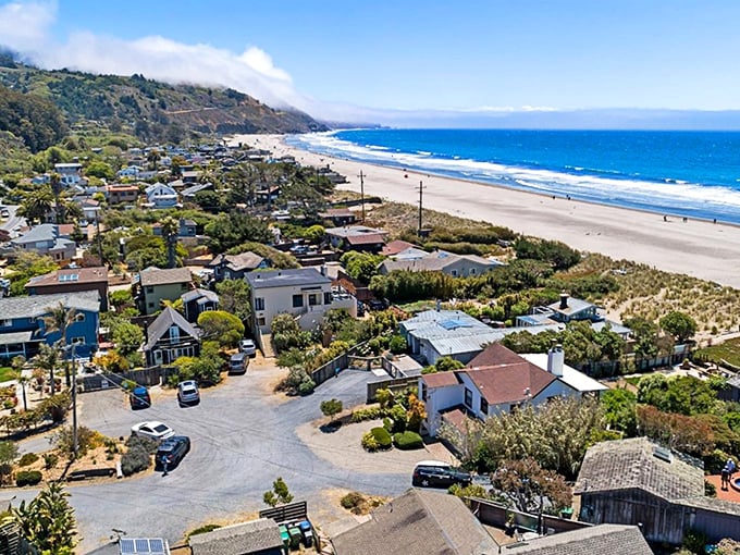 Bird's eye bliss! Stinson Beach unfurls like a sun-soaked ribbon, nestled between mountains and sea. Talk about location, location, location!