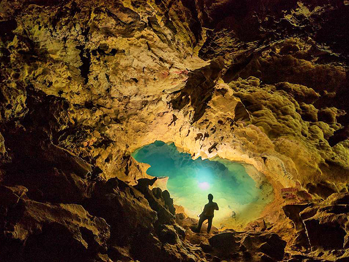 Nature's own light show, no electricity required. This stunning view is worth every crawl, climb, and stumble to reach it.