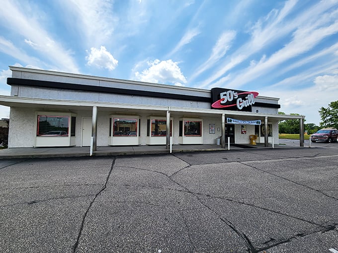Step into a time warp! 50's Grill's gleaming exterior promises a journey back to sock hops and soda fountains. Grab your saddle shoes and let's twist again!