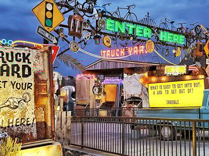 Welcome to the Twilight Zone of DIY! This entrance to Barney Smith's Toilet Seat Art Museum is like a fever dream at a yard sale.