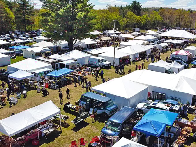 Explore endless vintage treasures and unique finds as you wander through the many sun-drenched tents at the Brimfield Flea Market.