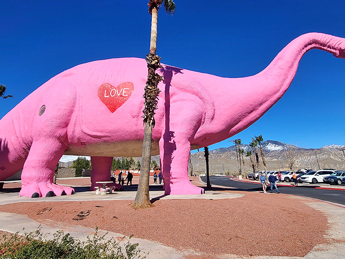Prehistoric pink perfection! This lovable dinosaur is the Barbie of the Jurassic world, turning heads and stealing hearts along the highway.