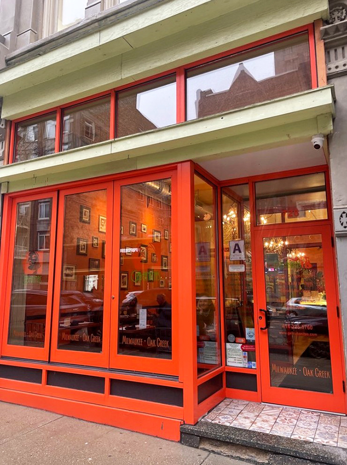 Cubanitas: A splash of Havana in Milwaukee! This vibrant orange facade promises a flavor fiesta inside.