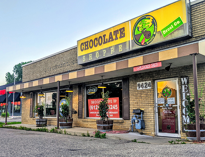 Droolin' Moose: Where chocolate dreams come true! This sunny storefront promises a sweet escape from the ordinary, with barrels of joy waiting inside.