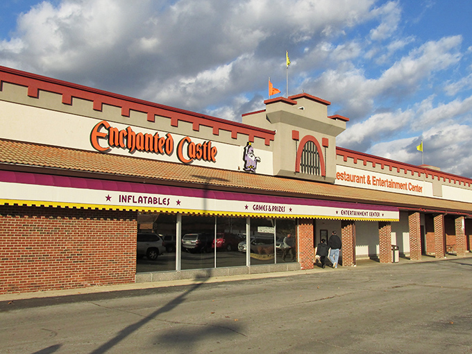 "Welcome to the castle, peasants! Enchanted Castle's facade promises a royal romp through childhood nostalgia, complete with inflatable kingdoms and game-filled treasuries."
